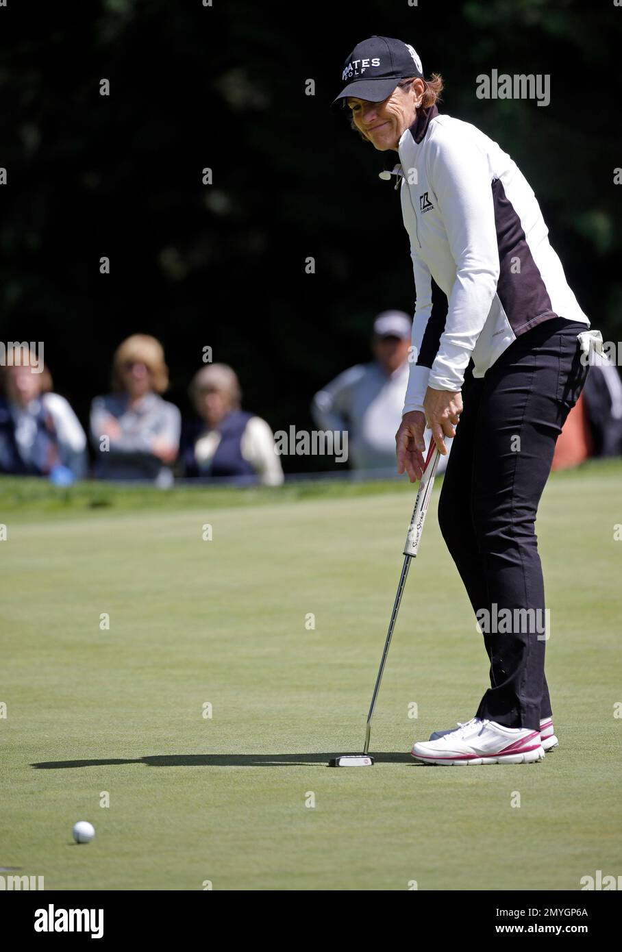 Julie Inkster reacts to her putt on the eighth green in the second ...