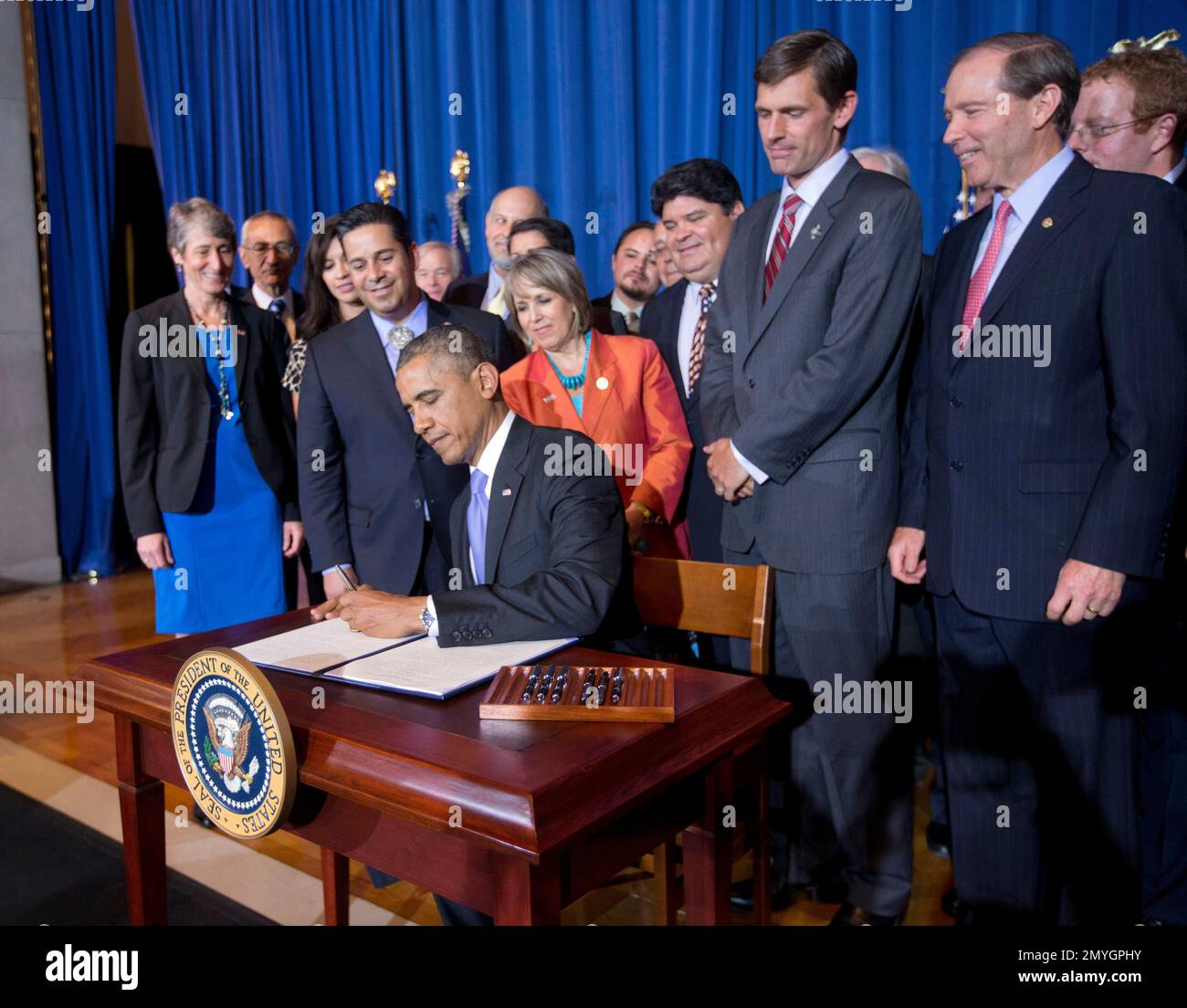 FILE - In this May 21, 2014 file photo, President Barack Obama signs a ...