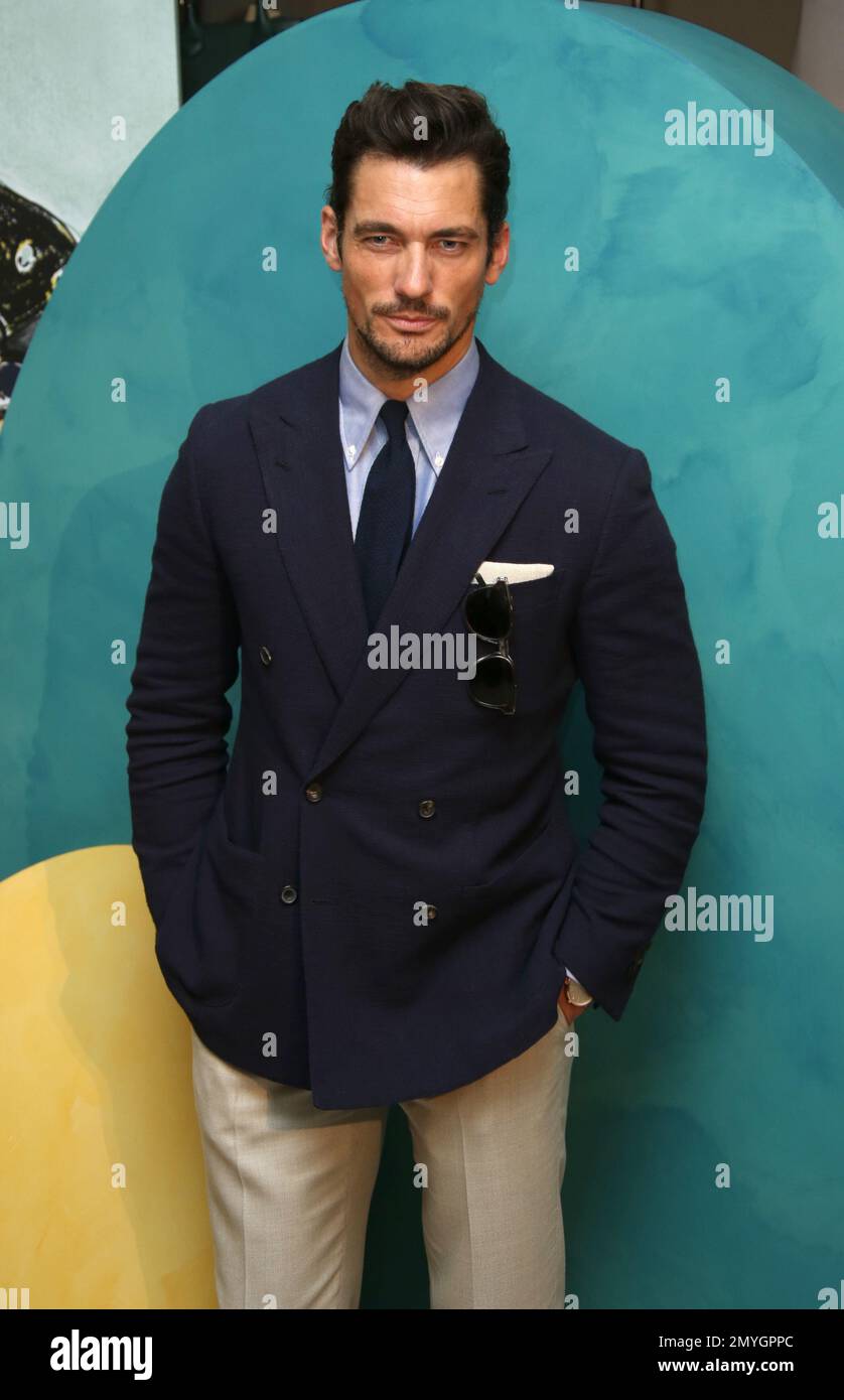 Model David Gandy poses for photographers upon arrival at the Burberry ...