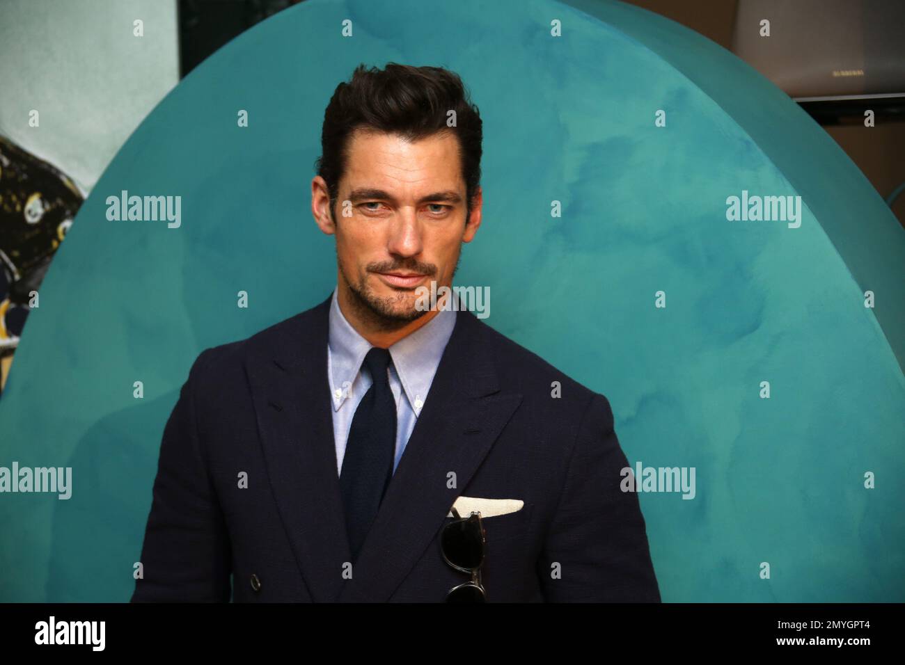 Model David Gandy poses for photographers upon arrival at the Burberry ...