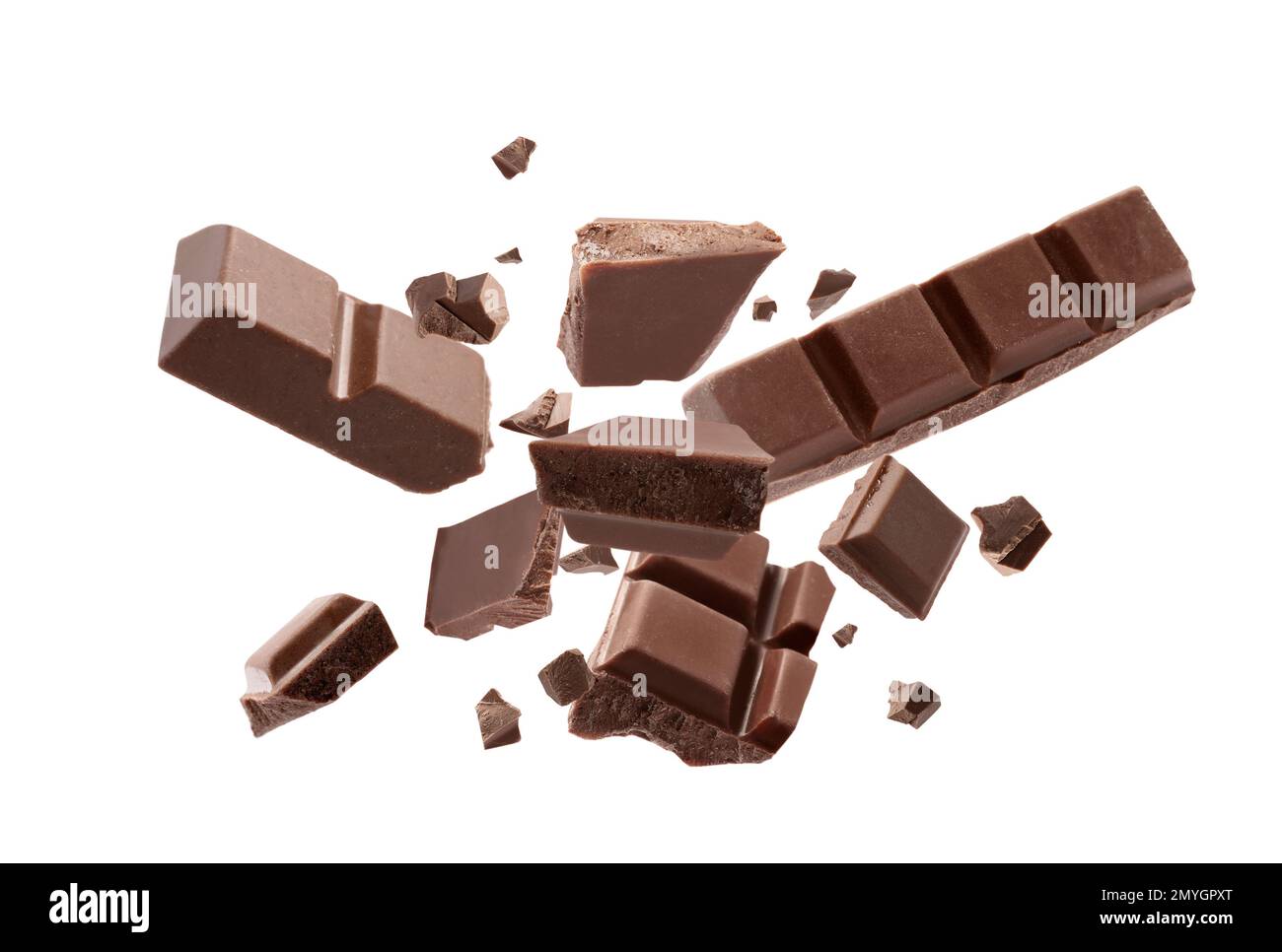 Milk chocolate explosion, pieces shattering on white background Stock ...