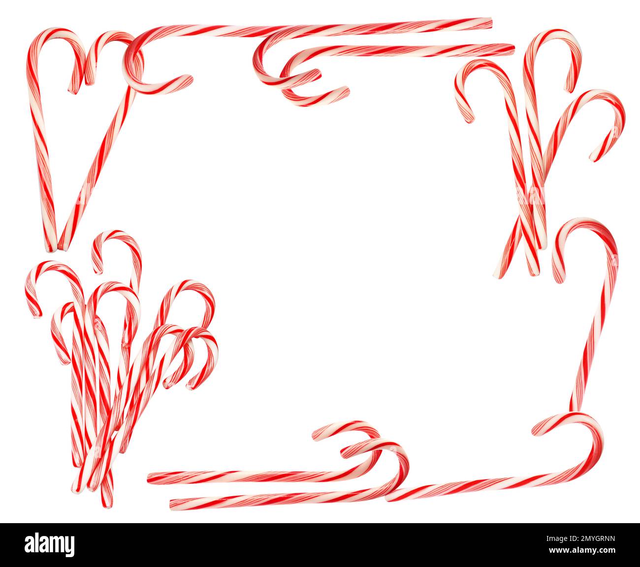 Frame of tasty Christmas candy canes on white background Stock Photo ...