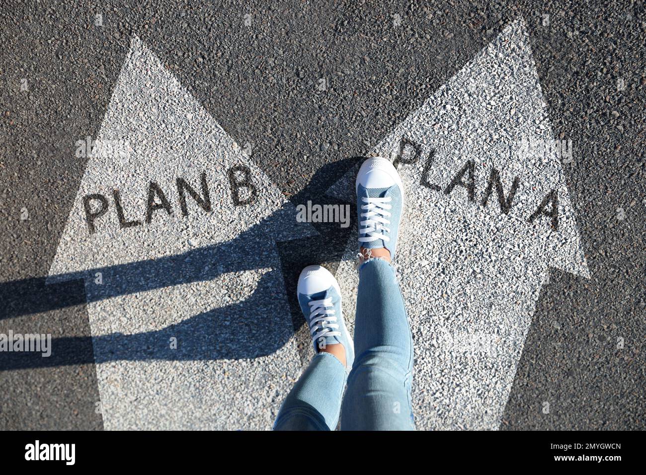 Choosing between Plan A and Plan B. Woman near arrows on road, above ... Choosing between Plan A and Plan B. Woman near arrows on road, above ...