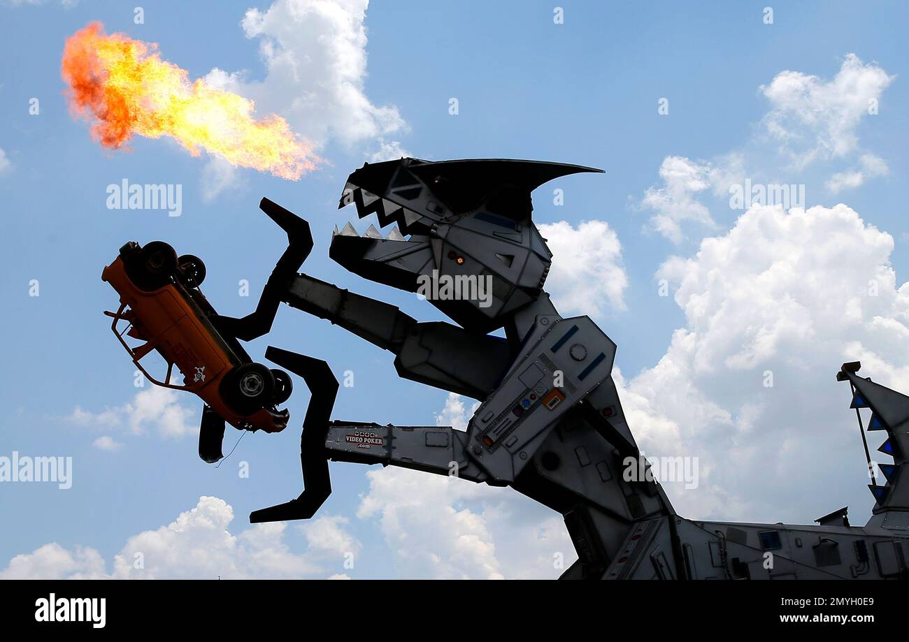 Robosaurus, a mechanical customized tractor trailer, is operated by ...