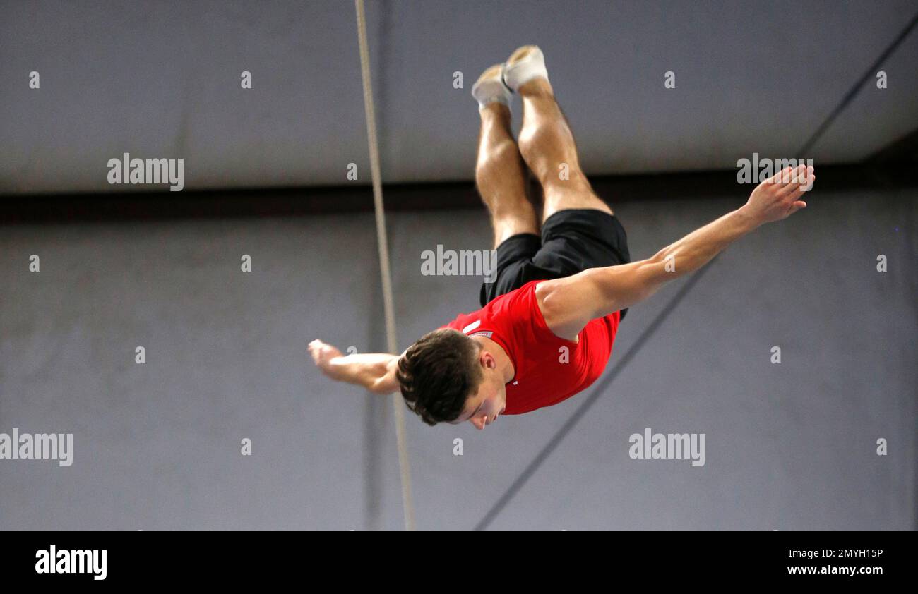 Trampoline gymnast Aliaksei Shostak practices his routine in Lafayette ...