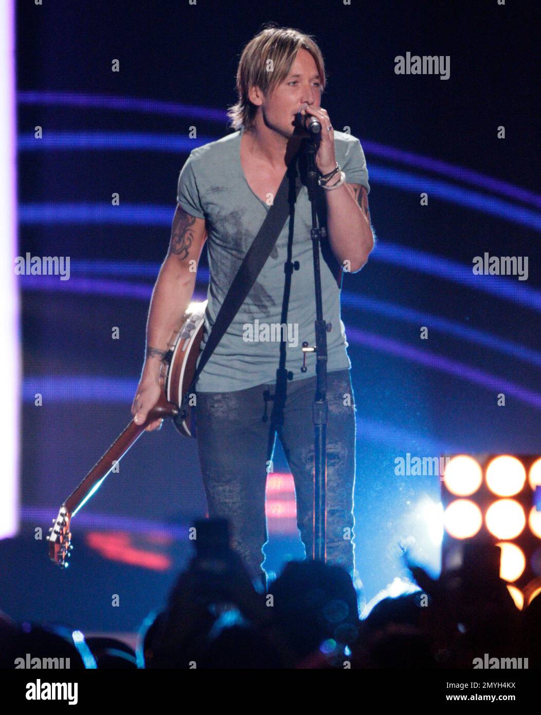 Keith Urban perform “Wasted Time” at the CMT Music Awards at the ...