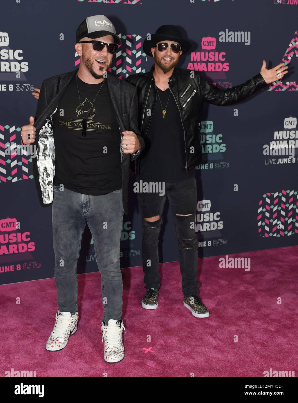 Chris Lucas, left, and Preston Brust, of LoCash, arrive at the CMT ...