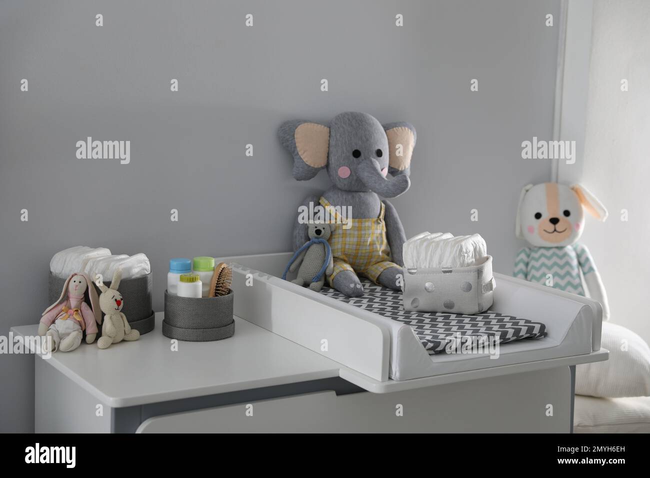 Modern changing table in baby room. Interior design Stock Photo - Alamy