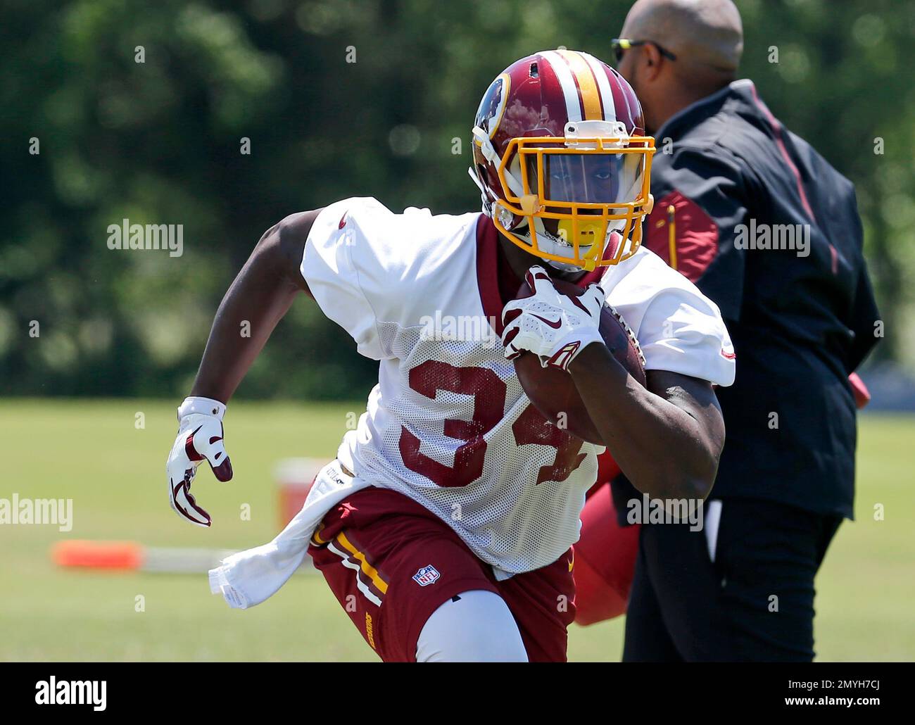 Washington Redskins running back Mack Brown (34) runs a drill during ...