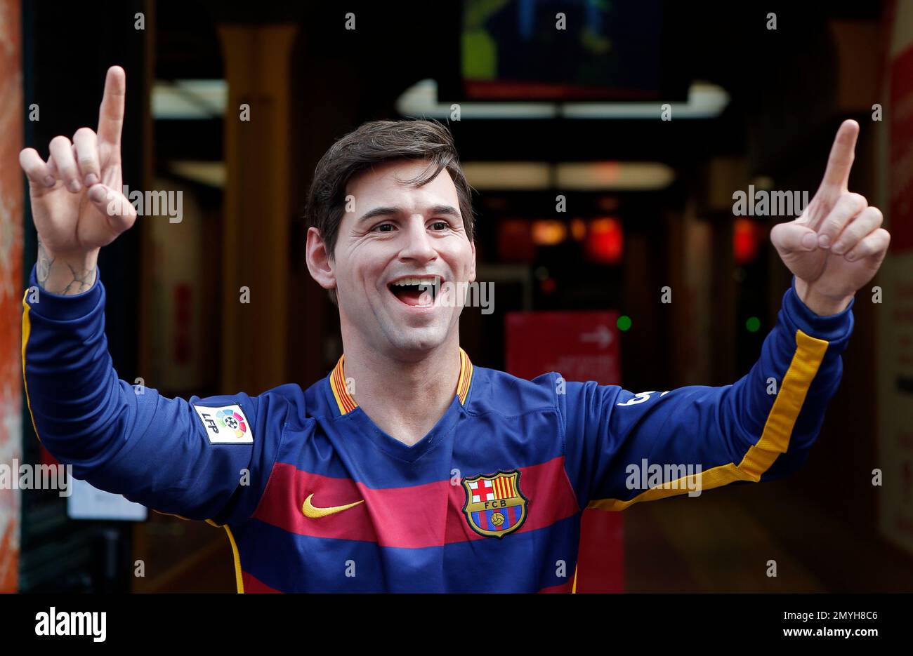 The life-size wax figure of Barcelona's Lionel Messi is presented at ...
