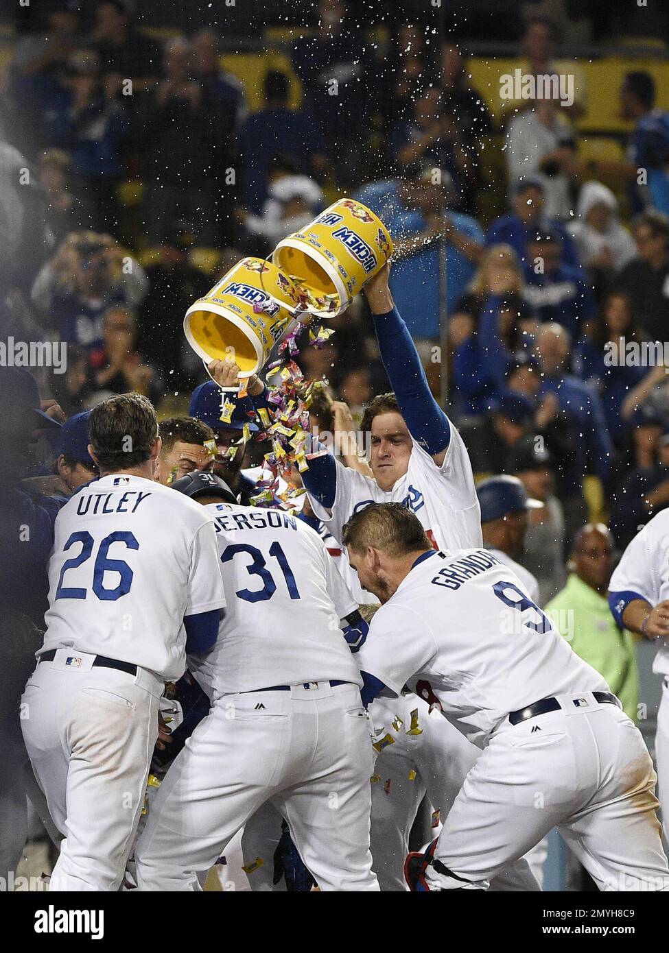 The Los Angeles Dodgers celebrate a walk-off home run by Trayce ...