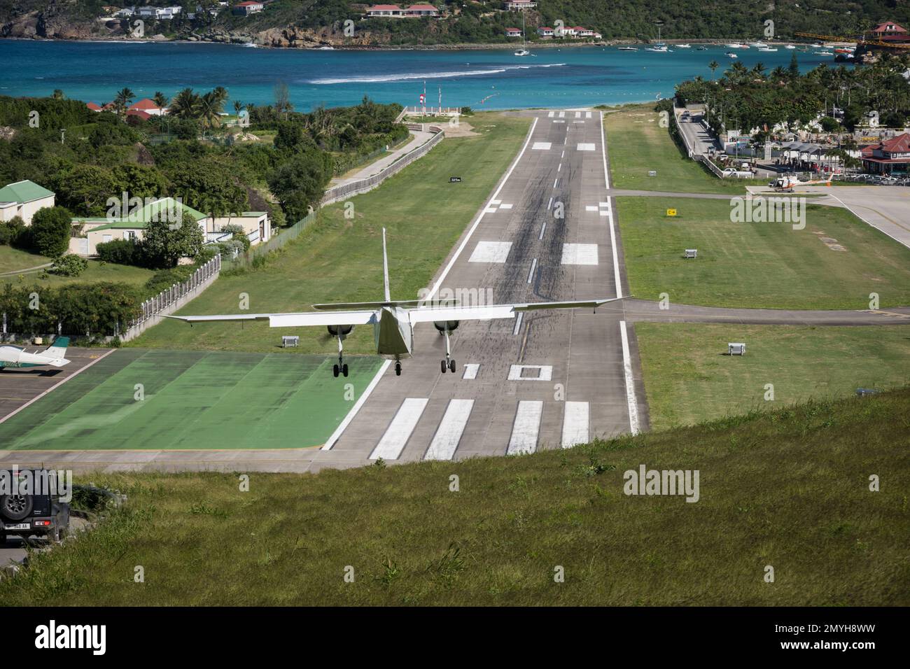 Aircraft landing on the runway at Rémy de Haenen Airport on the French ...