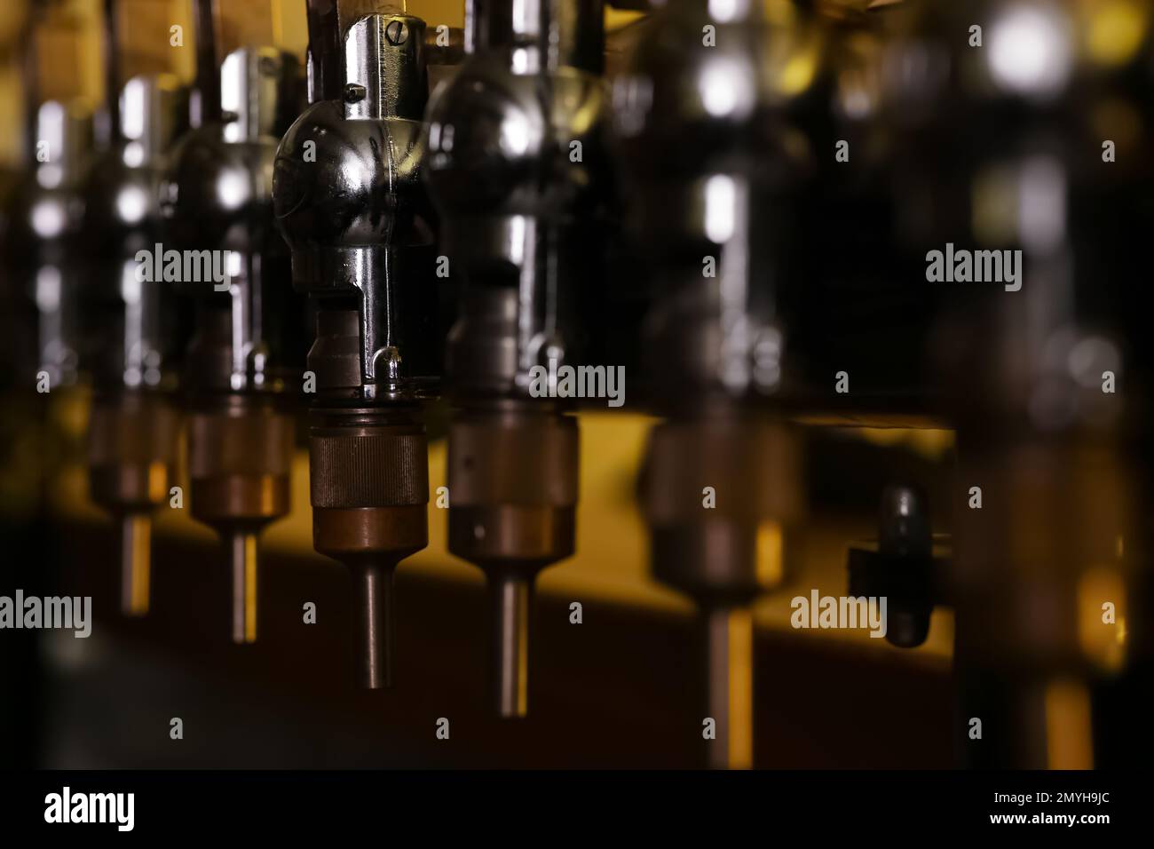 New modern beer taps in pub, closeup. Professional bar equipment Stock ...