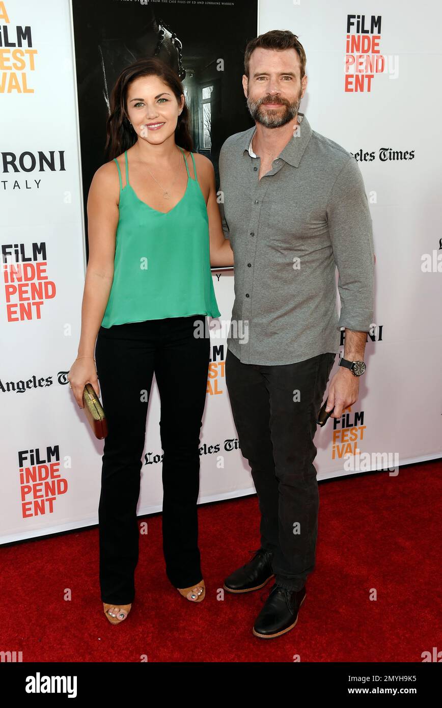 Actor Scott Foley and his wife Marika Dominczyk pose together at the ...