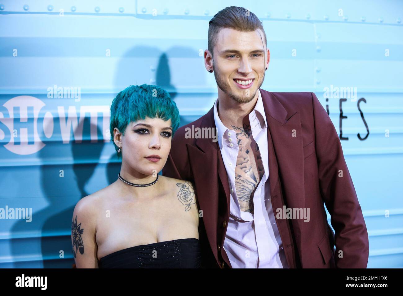 Halsey, left, and Machine Gun Kelly arrive at the Season One Premiere ...