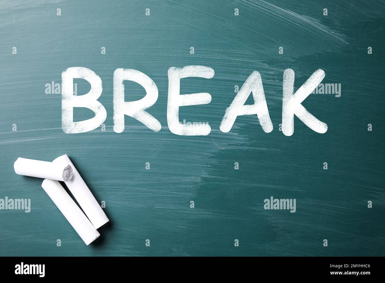 Word Break and chalk on greenboard, top view. School holidays Stock ...