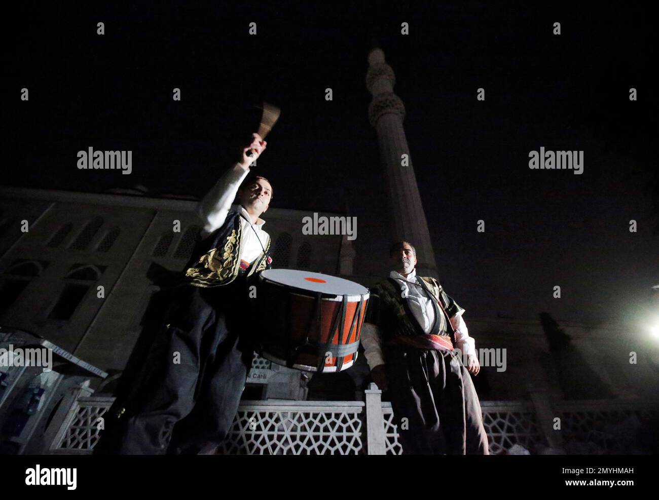 On the first day of the Muslim holy month of Ramadan, a drummer ...