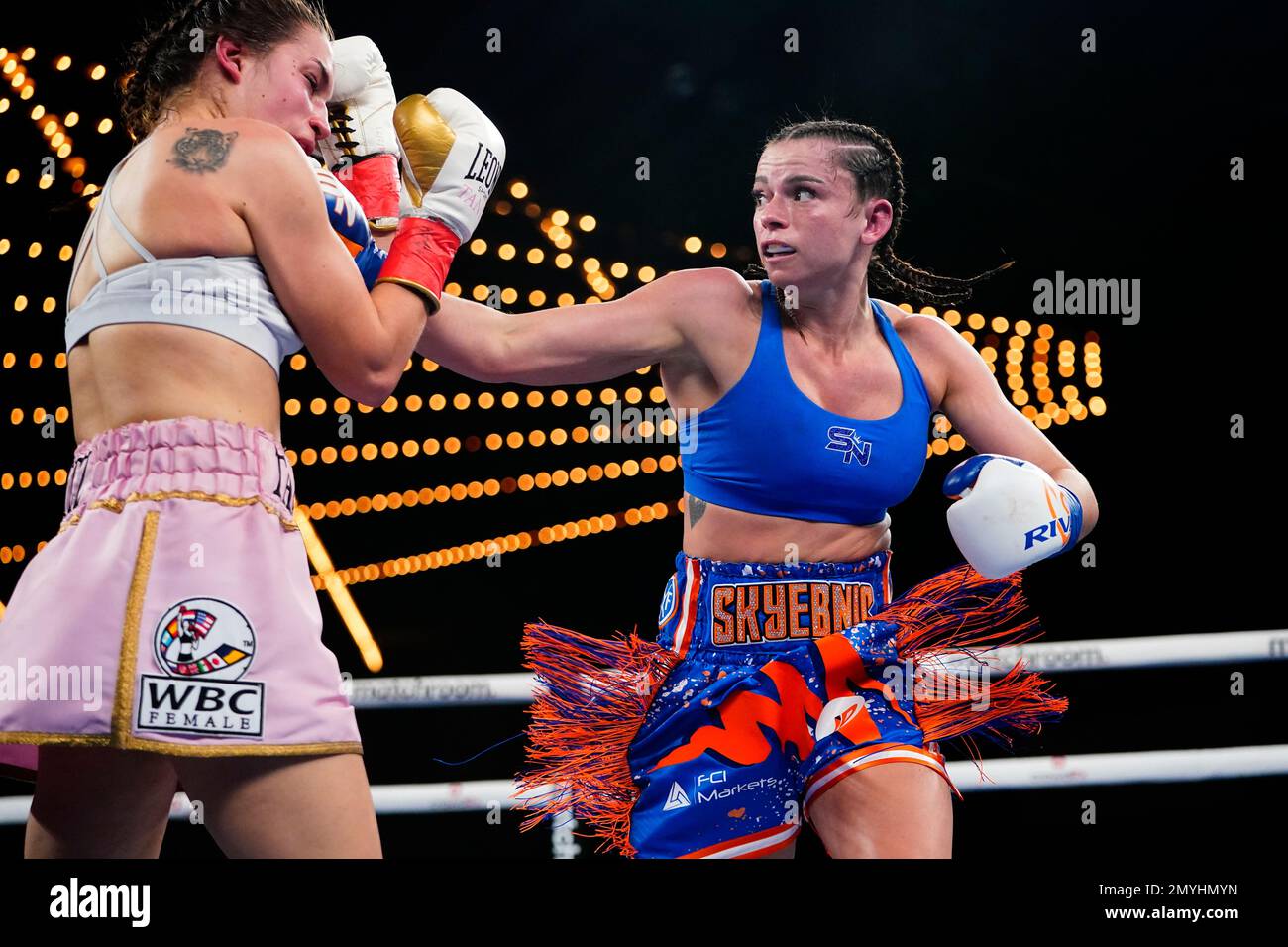 Australia's Skye Nicolson, right, punches Spain's Tania Alvarez during ...