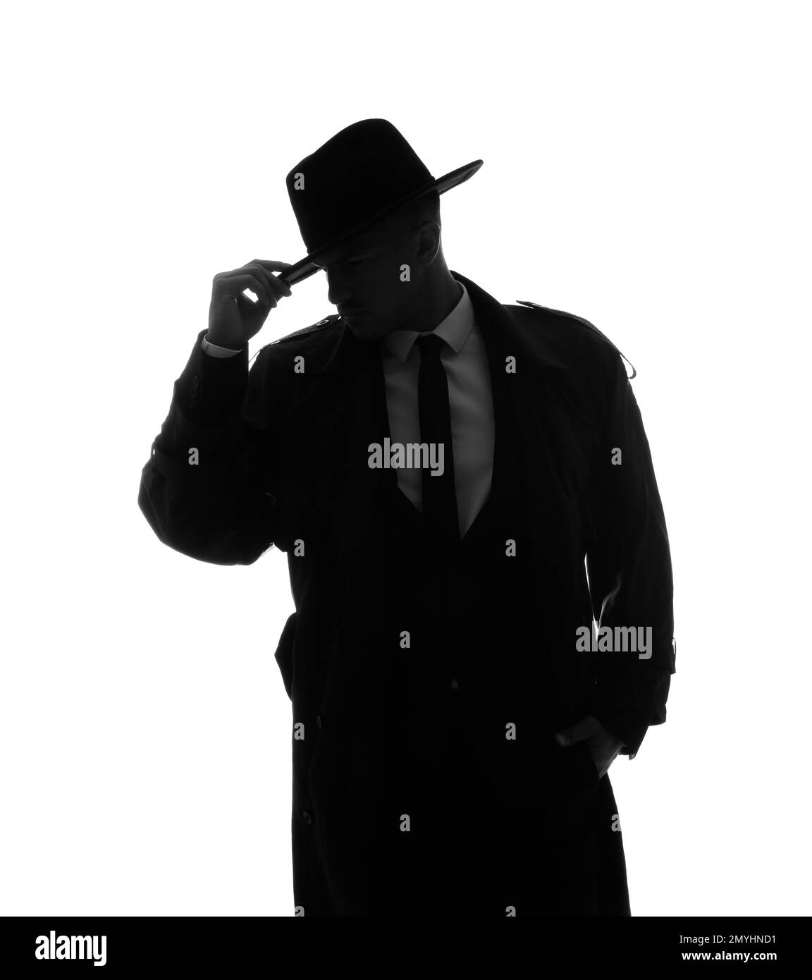 Old fashioned detective in hat on white background Stock Photo - Alamy