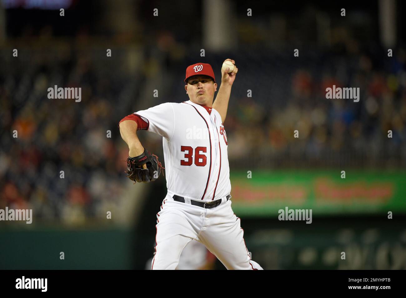 Washington Nationals relief pitcher Sammy Solis (36) delivers a pitch ...