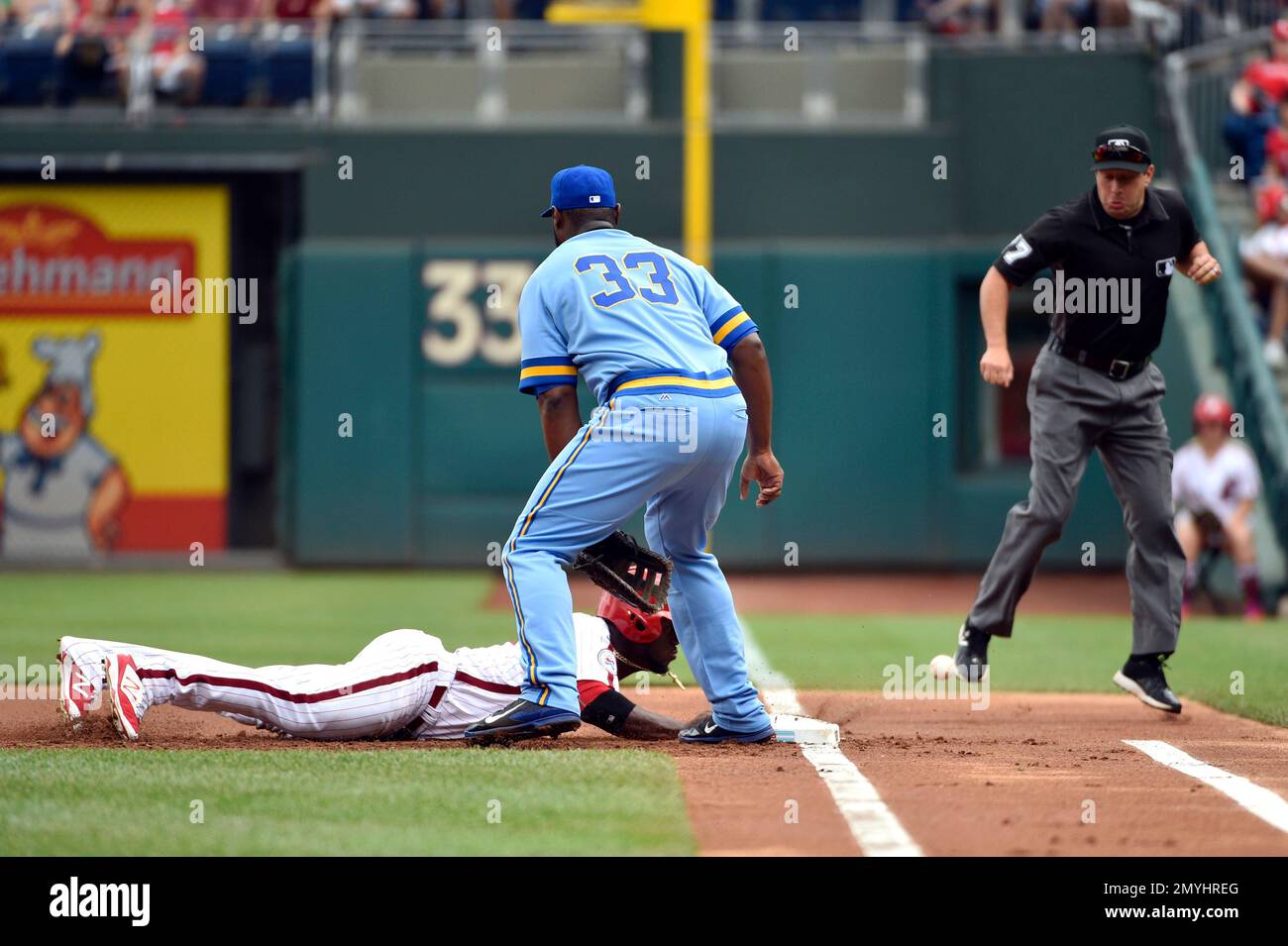 Milwaukee Brewers first baseman Chris Carter (33) is unable to catch ...