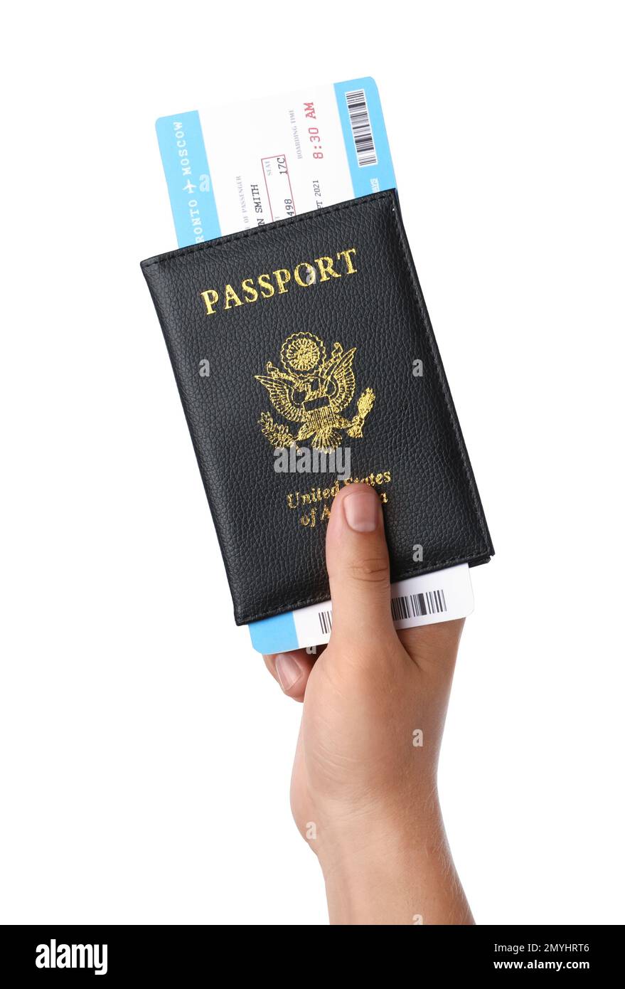 Woman holding passport and ticket on white background, closeup. Travel ...