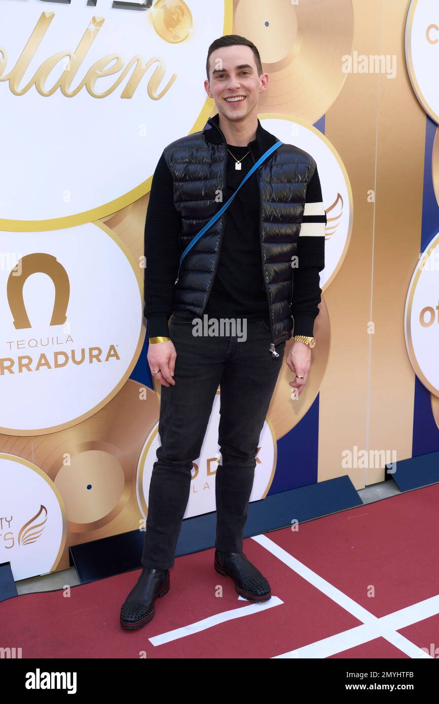 Adam Rippon arrives at the 10th annual Gold Meets Golden event on ...