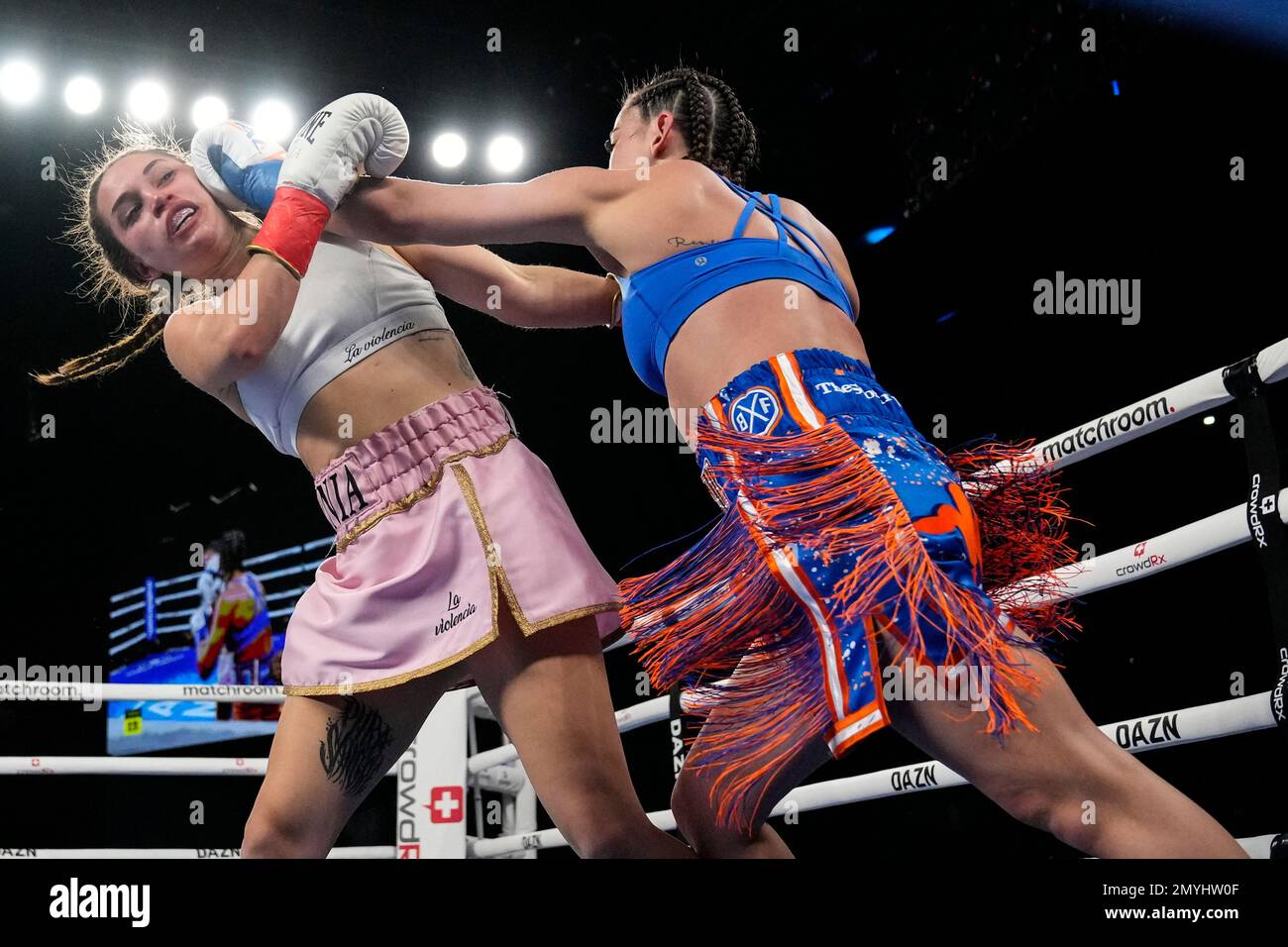 Australia's Skye Nicolson, right, punches Spain's Tania Alvarez during ...