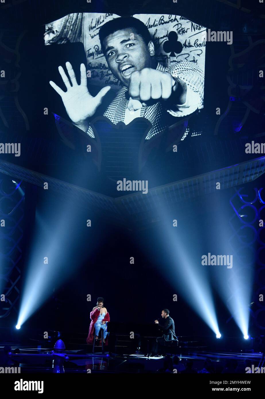 Andra Day, left, and John Legend perform a tribute to Muhammad Ali at ...