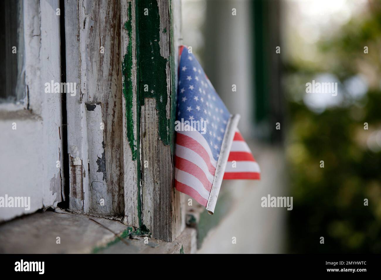 In this Dec. 11, 2015 photo, an American flag is seen outside the ...