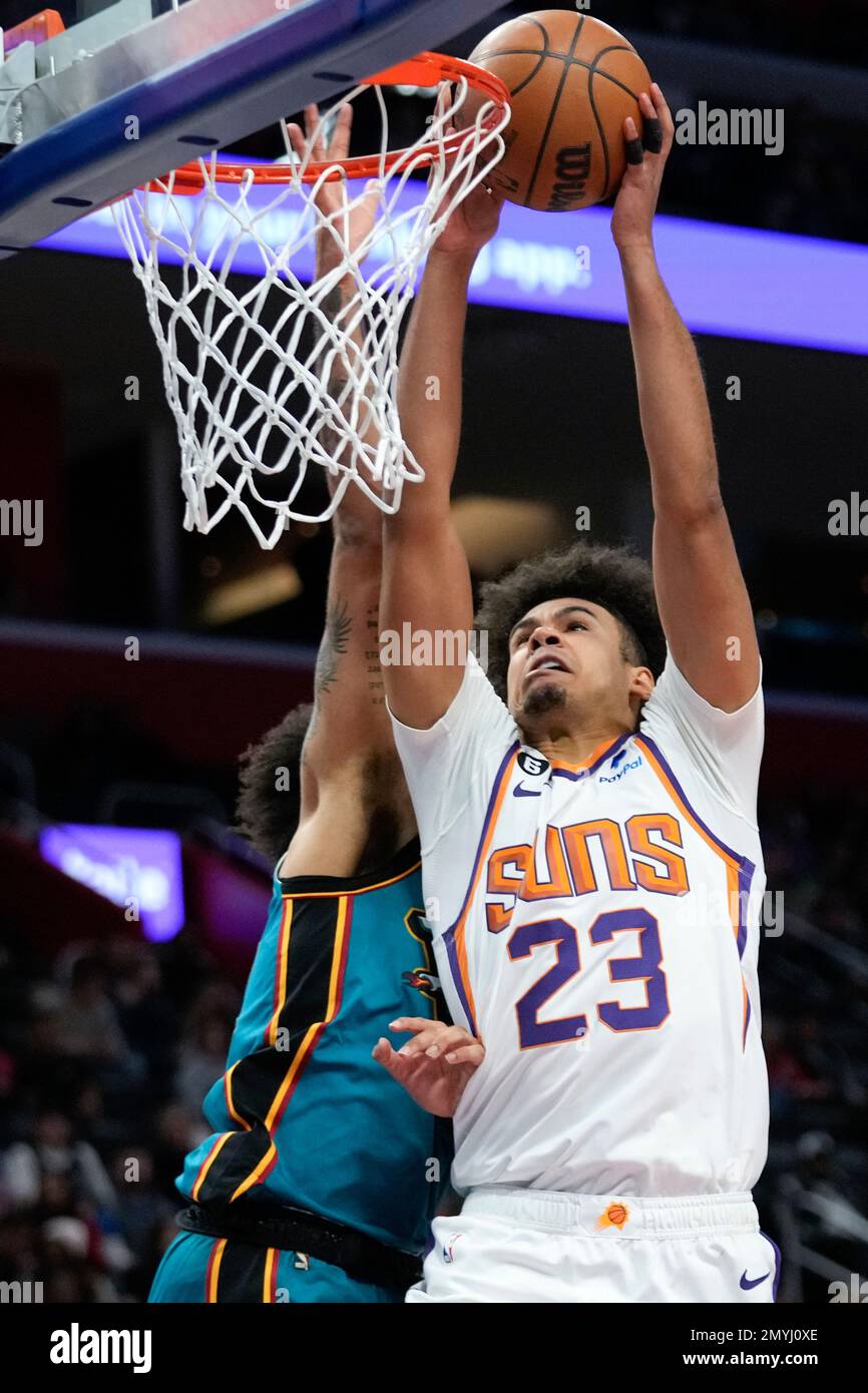 Phoenix Suns forward Cameron Johnson (23) dunks on Detroit Pistons ...