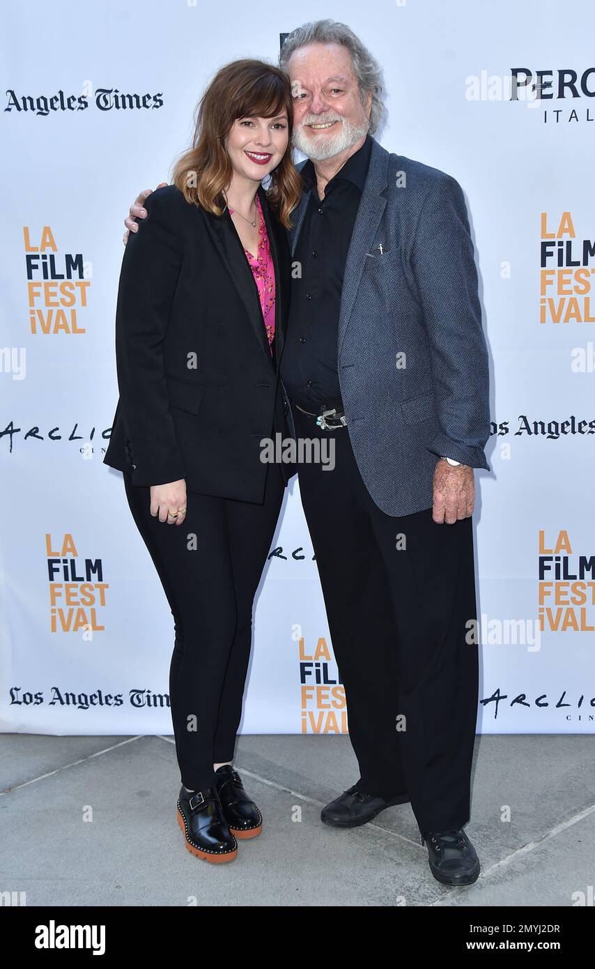 Amber Tamblyn and Russ Tamblyn arrive at the premiere of "Paint It ...