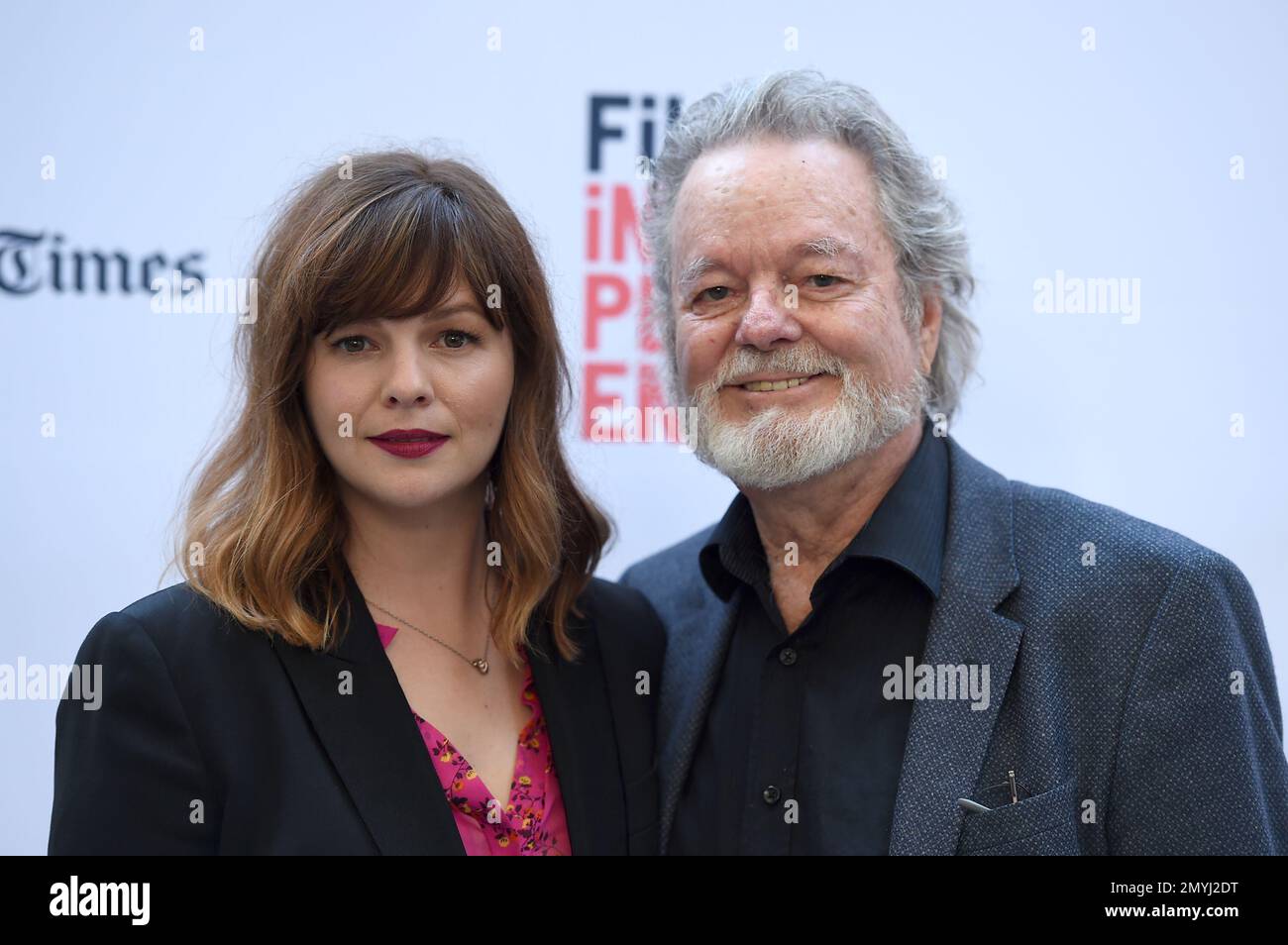 Amber Tamblyn and Russ Tamblyn arrive at the premiere of "Paint It ...