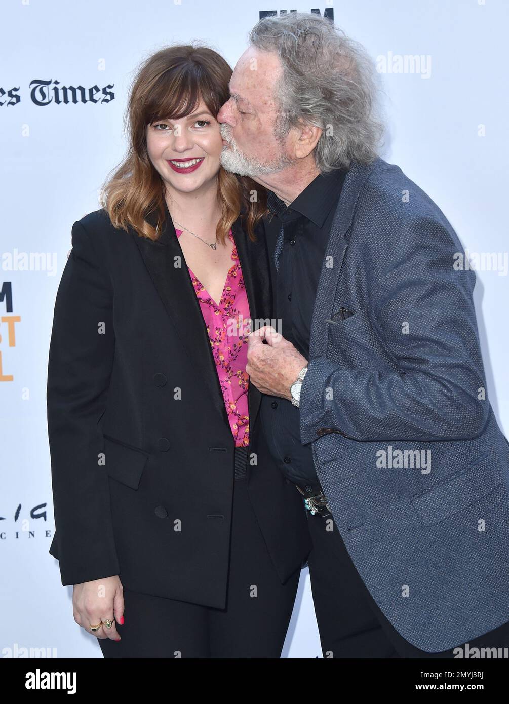 Amber Tamblyn, left, and Russ Tamblyn arrive at the premiere of "Paint ...