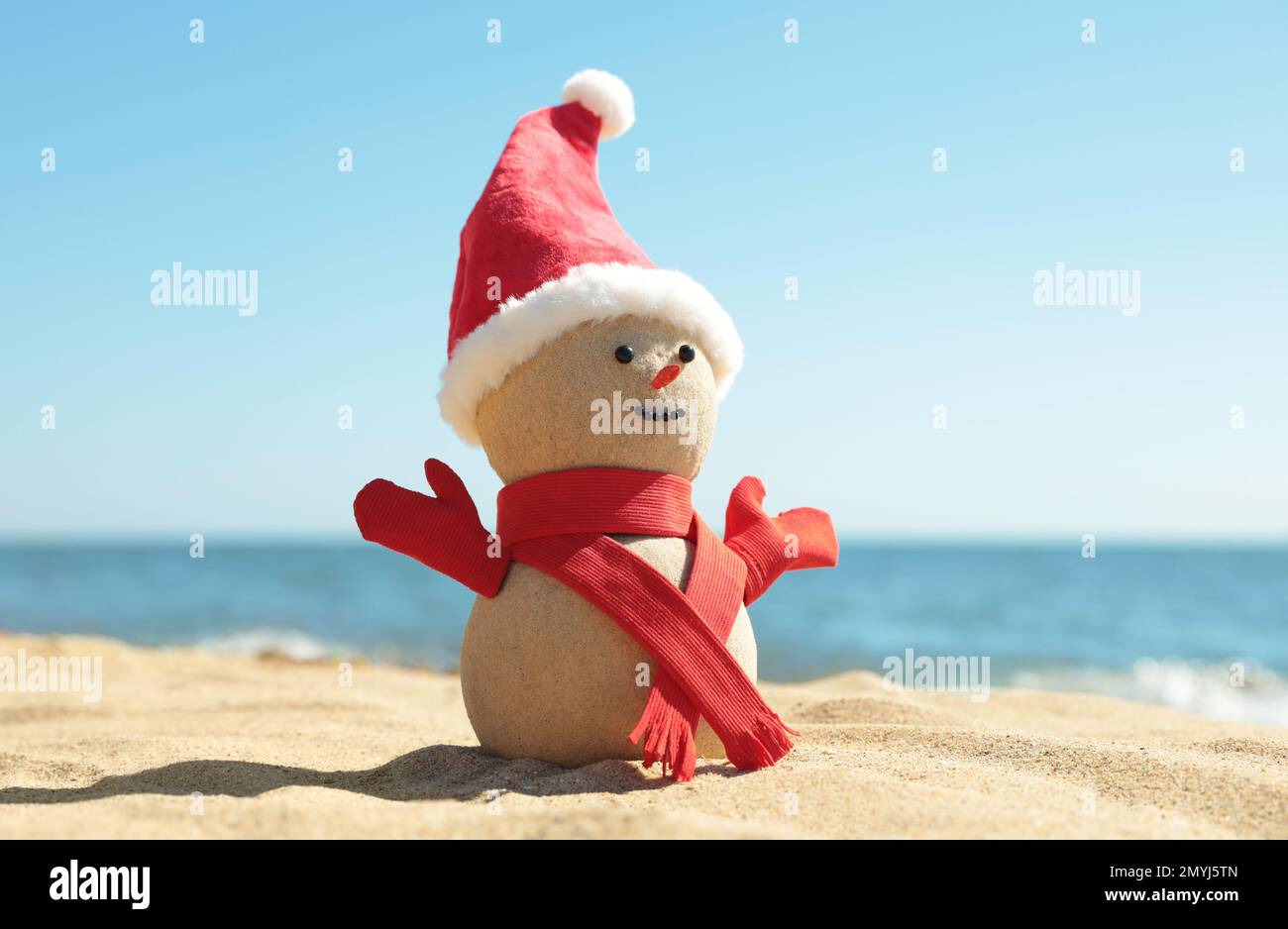 Snowman made sand on beach hi-res stock photography and images - Alamy