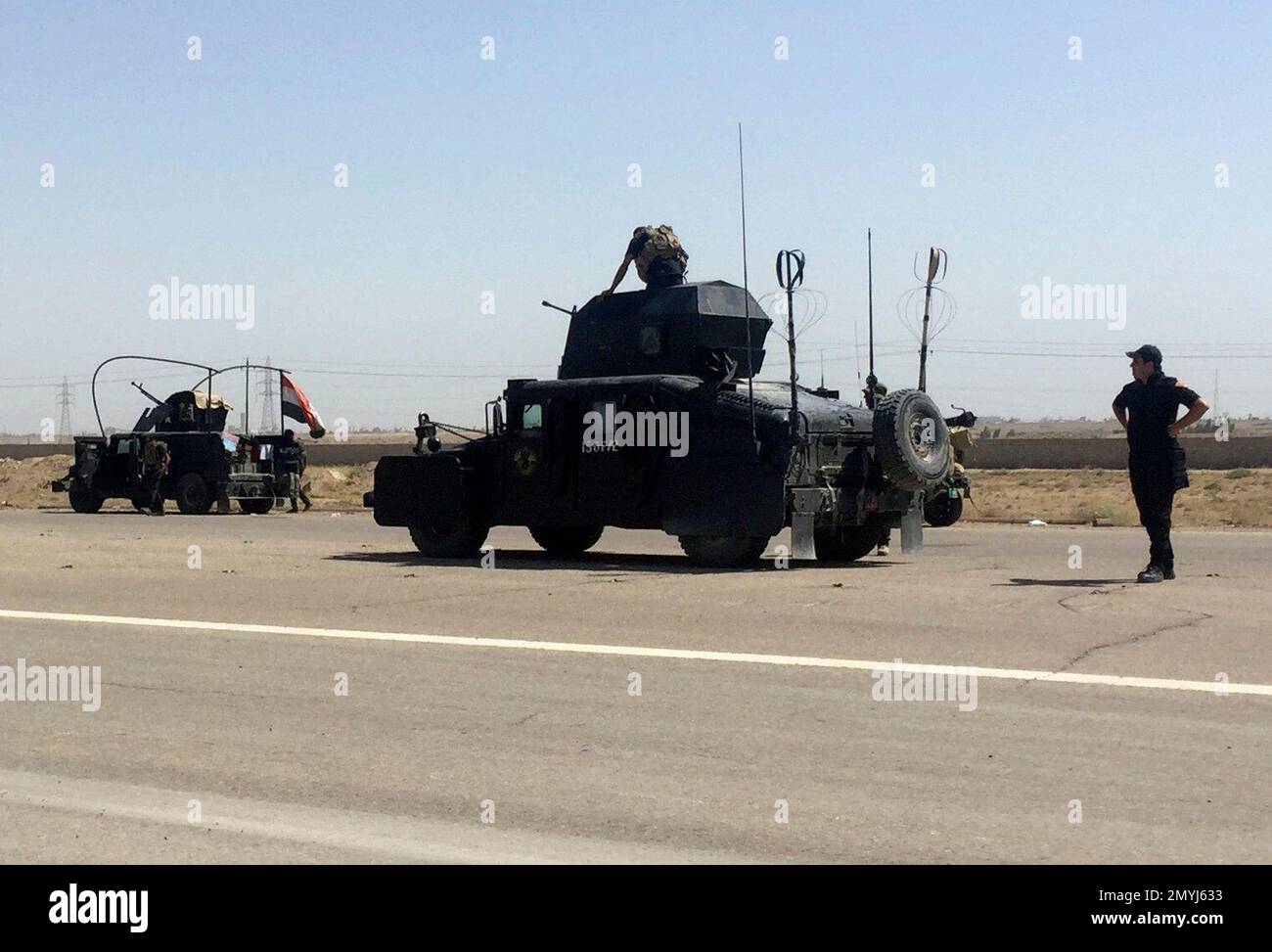 Iraqi military forces prepare for an offensive into Fallujah to retake ...
