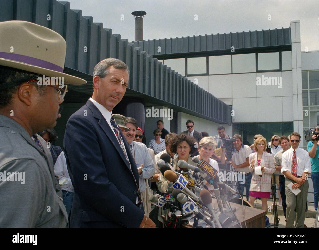 New York State Police Captain Walter Heesch, second from left, speaks ...