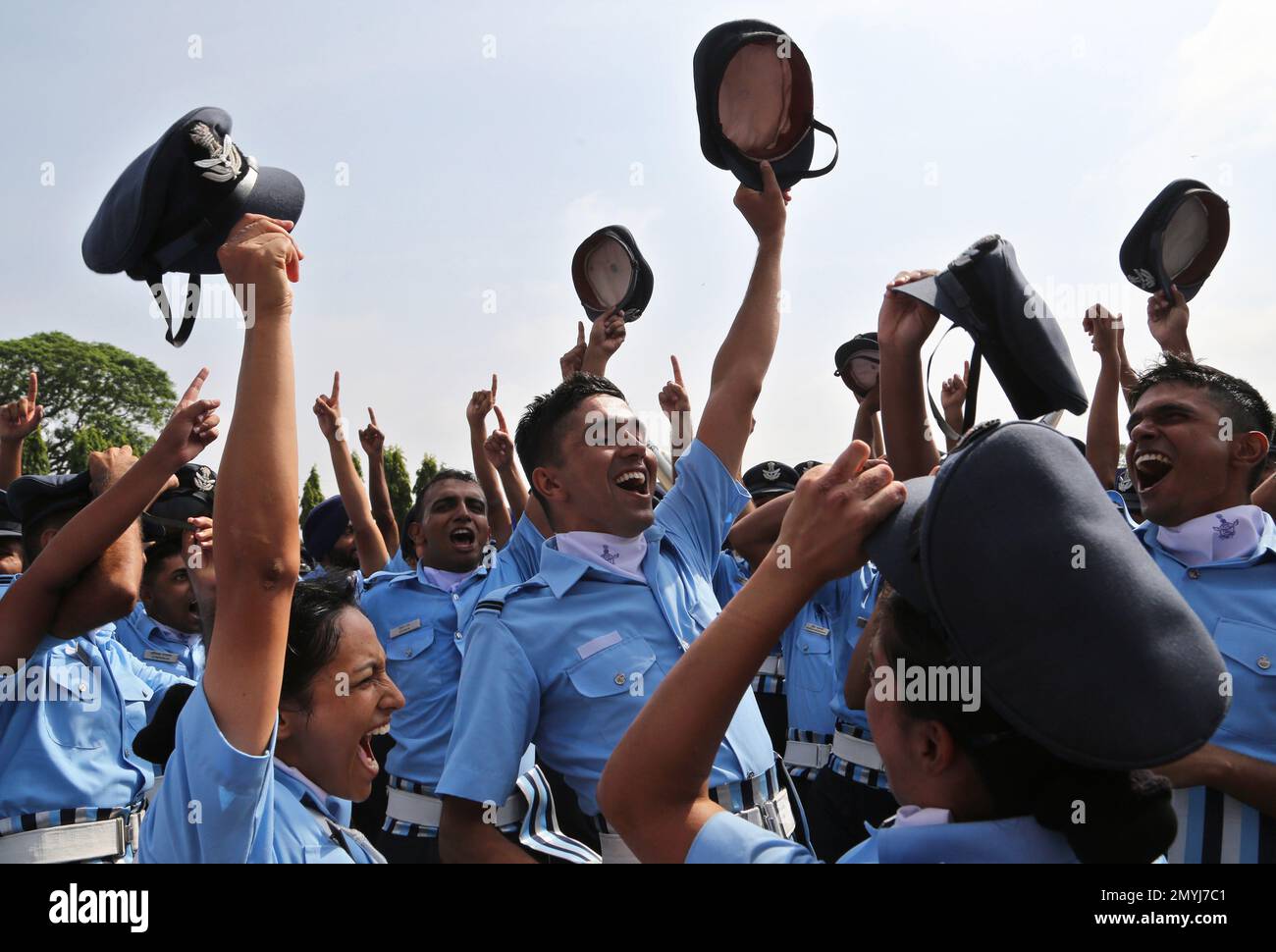 Indian Air Force (IAF) officers raise their caps to celebrate their ...