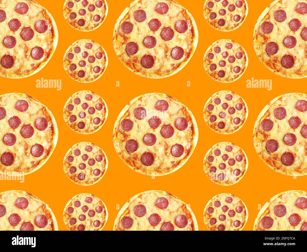 Pepperoni pizza pattern design on orange background Stock Photo - Alamy