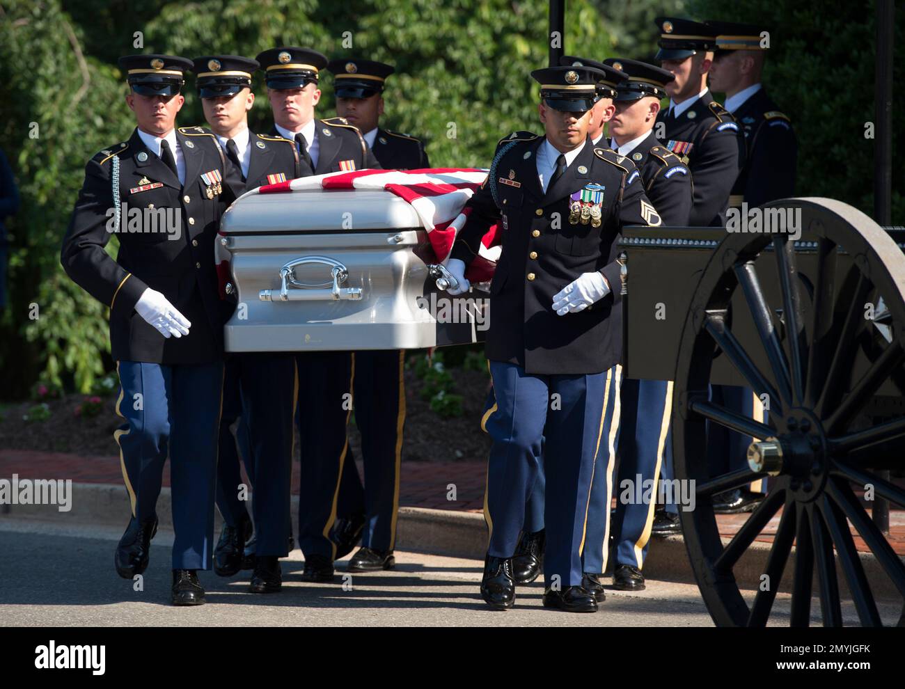 The casket of Stephanie Rader, Captain, U.S. Army, is placed onto a ...