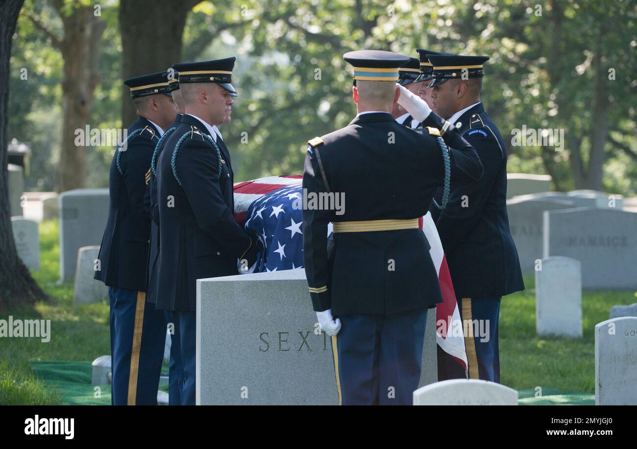 The casket of Stephanie Rader, Captain, U.S. Army, is placed during a ...