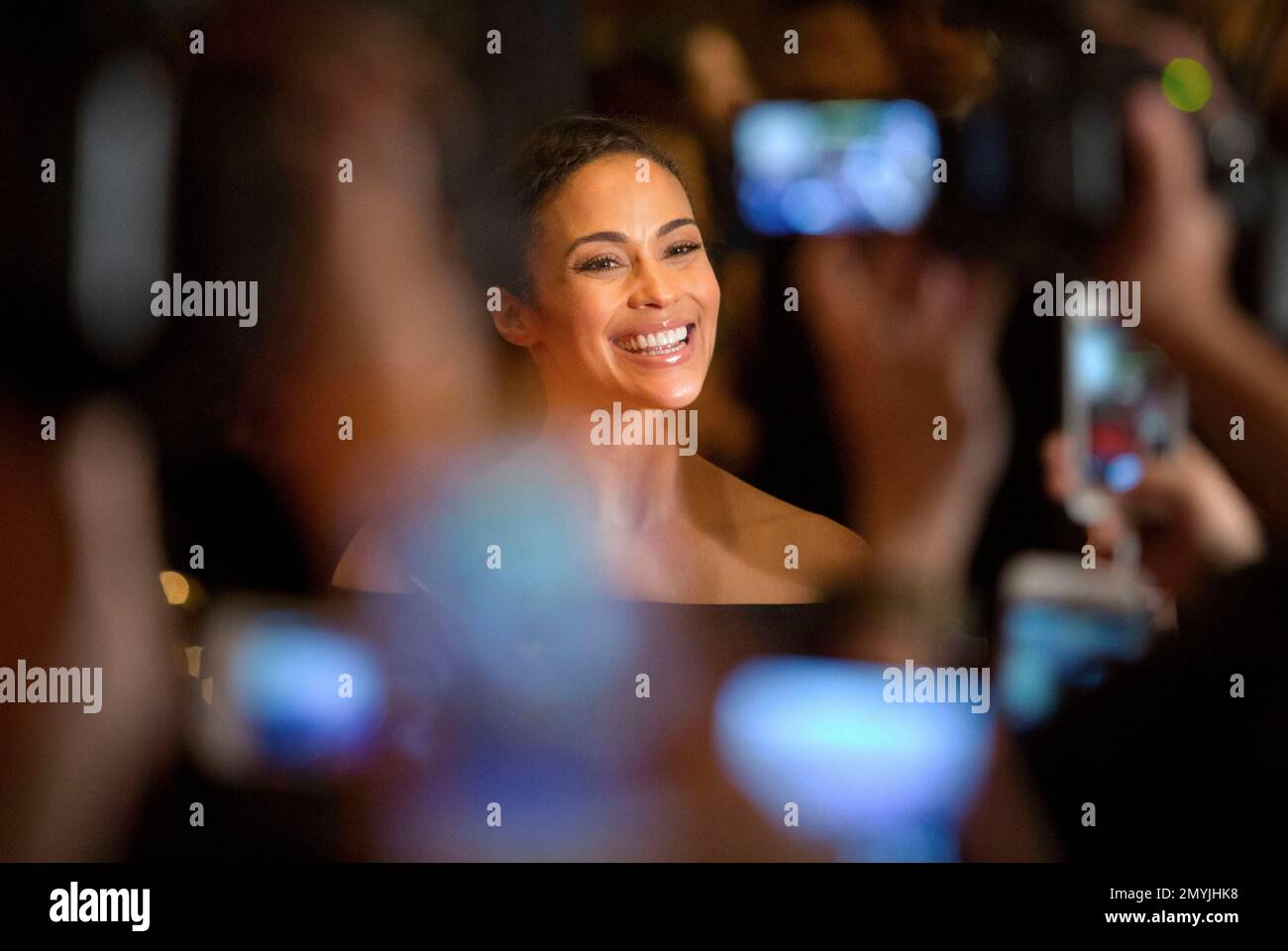 Actress Paula Patton smiles as she arrives at a red carpet event for ...