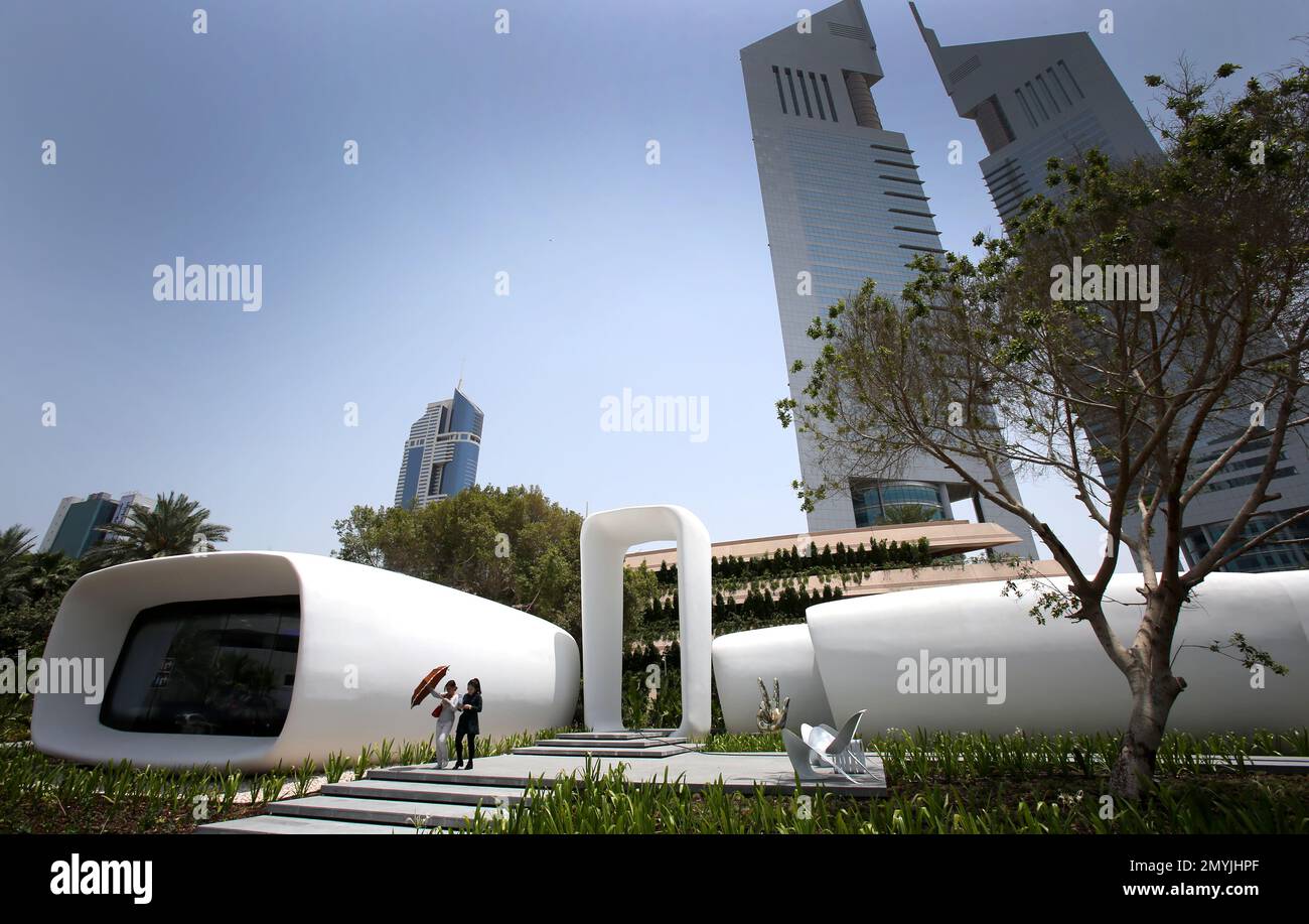 In this Tuesday, May 31, 2016 photo, two women pass what the United ...