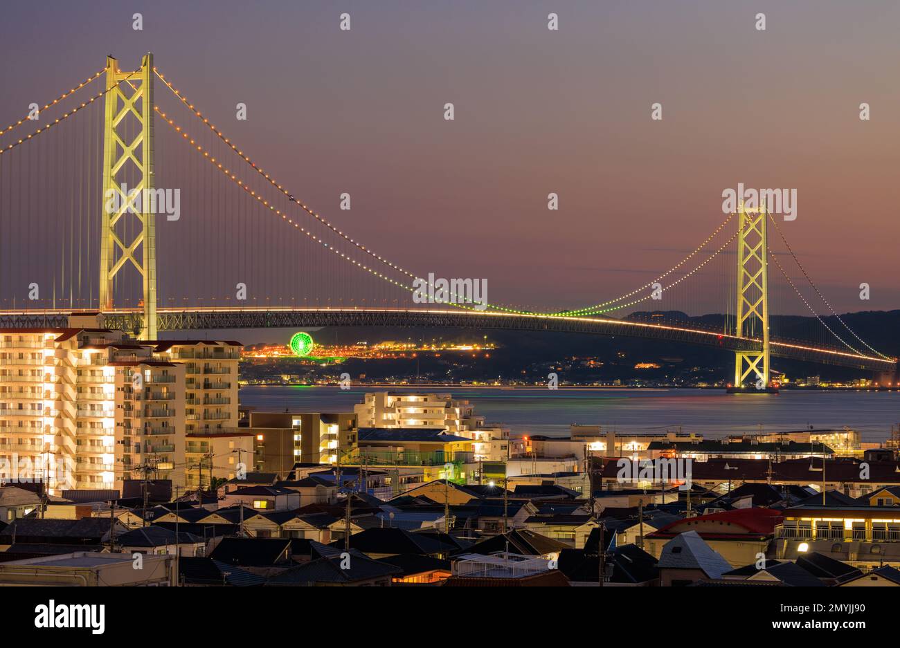 Akashi Suspension Bridge Lit with Rainbow Colors over City at Night ...