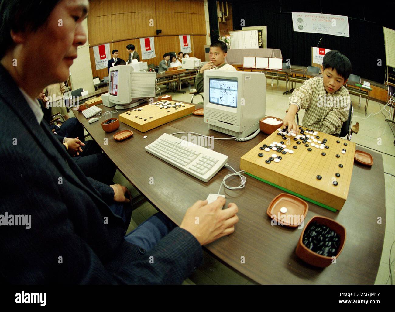 Lin Jee-Han, right, 11-year-old junior group champion of World Youth Go ...