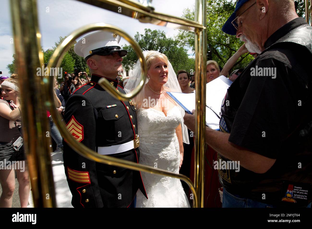 Chaplain Stephen Racz marries Marine Tim Chambers and Lorraine Heist ...