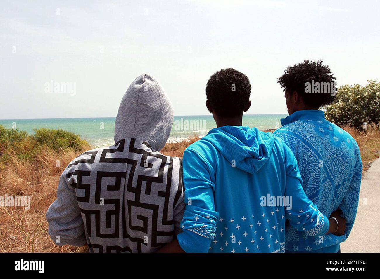 Filmon Selomon, right, Mabtom Tekle, center, and Awad Weldemariam look ...