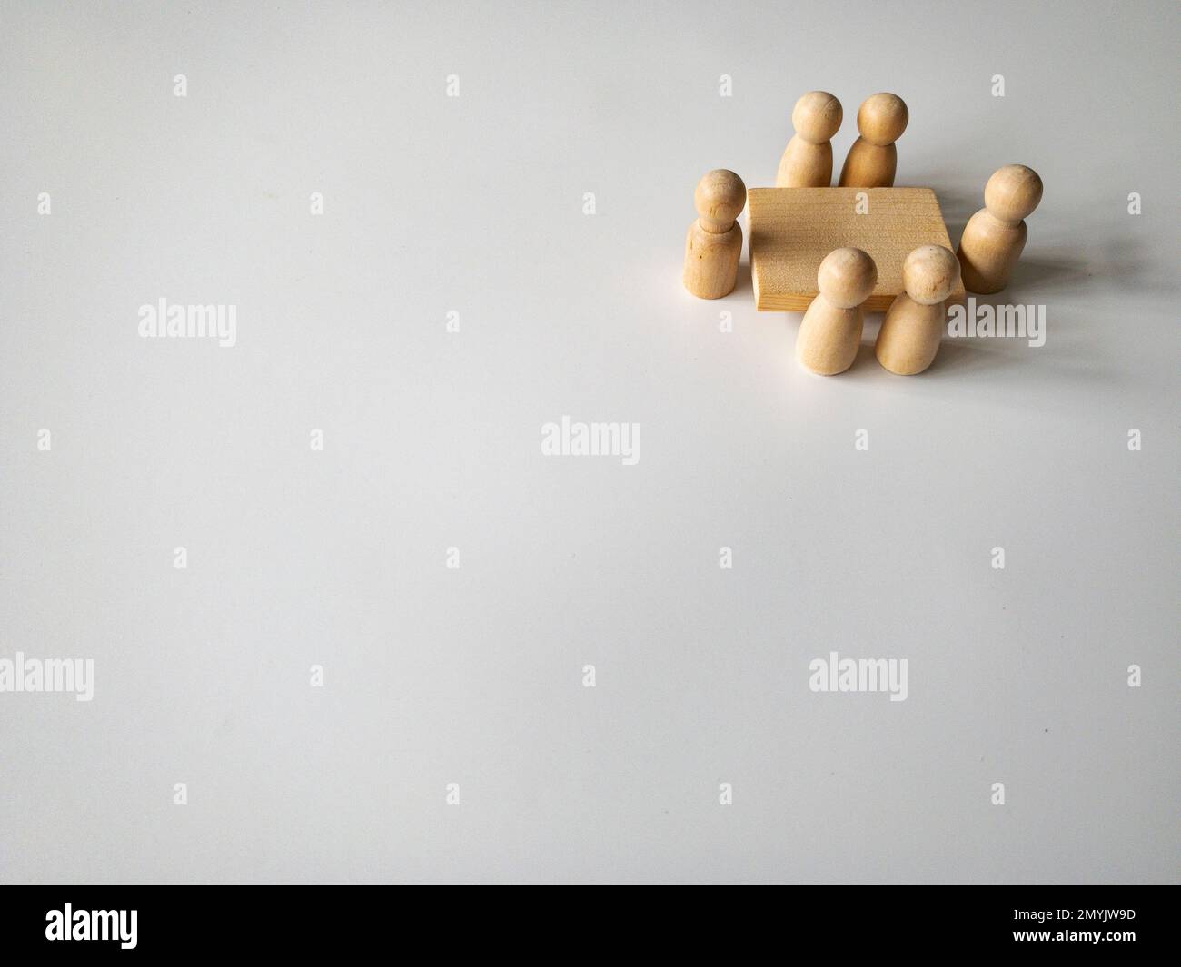 Wooden people figures having business meeting with customizable space ...