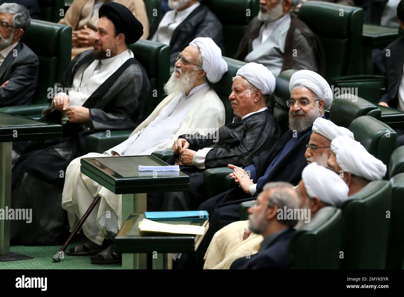 Iranian President Hassan Rouhani, right, head of the Expediency Council Akbar Hashemi Rafsanjani ...