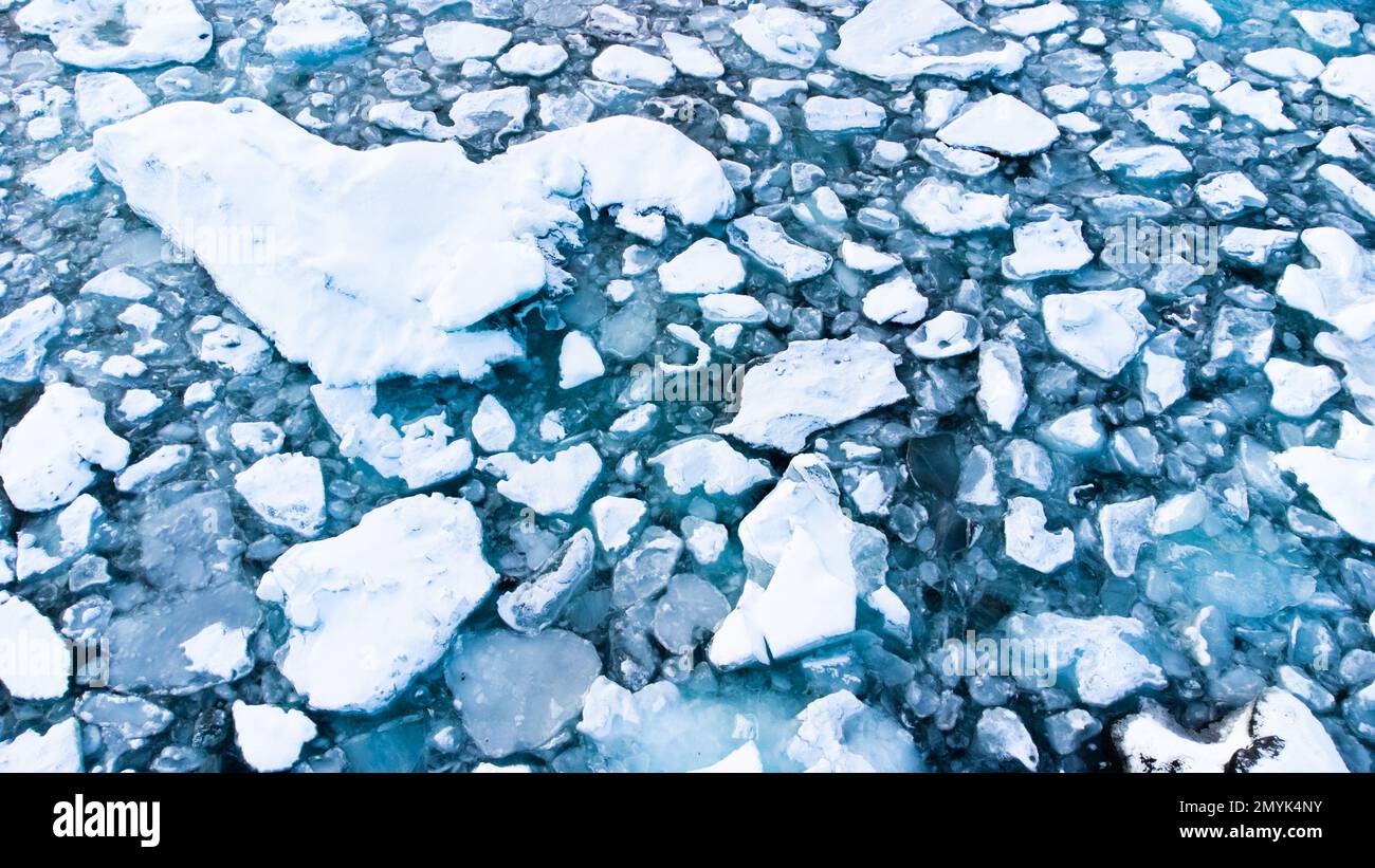 Melting Arctic Ice in Ocean Water, Blue Glacier Ice with Snow in ...